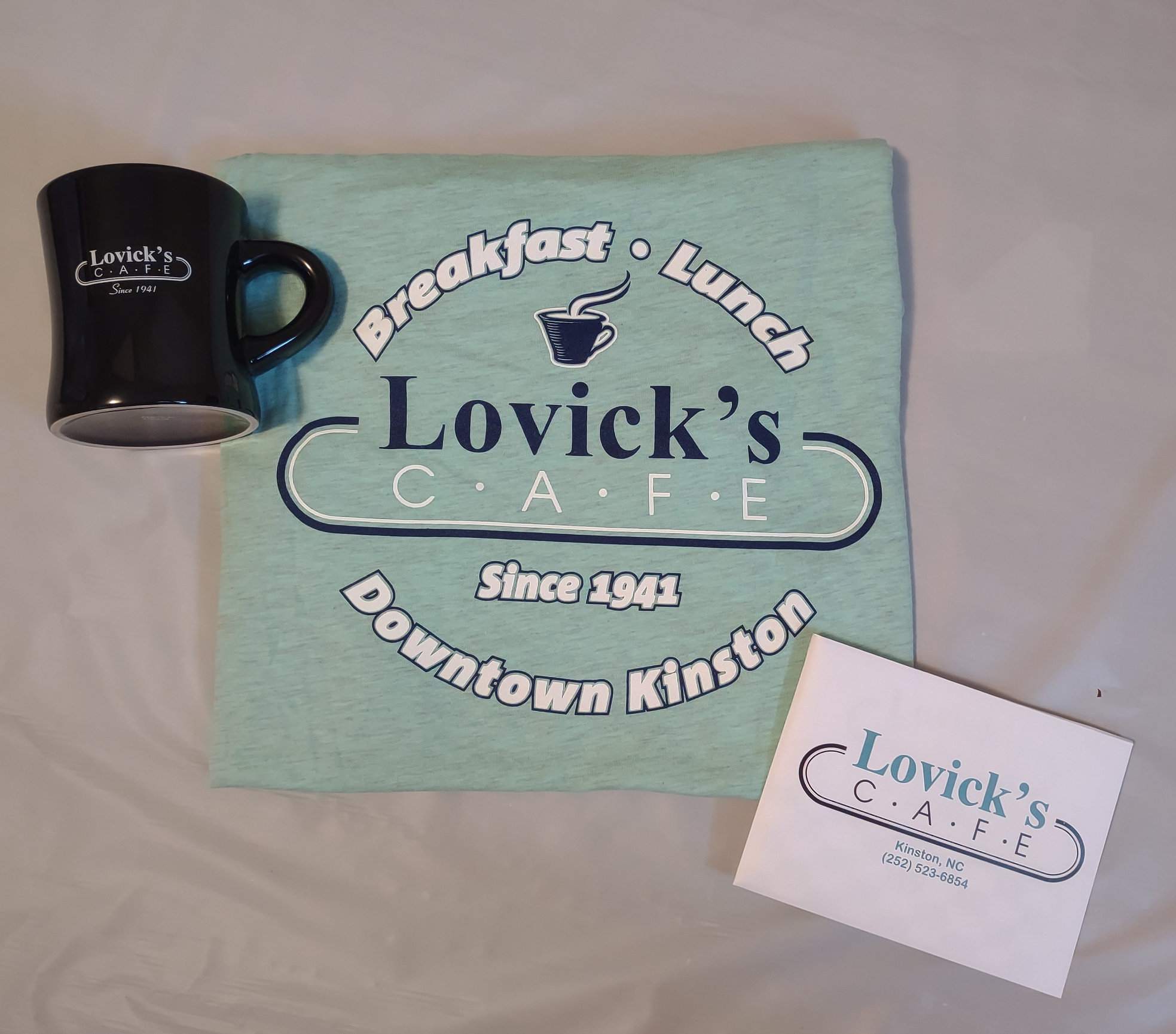 (12) Lovick's Cafe Shirt, Mug, & $25 Gift Certificate - RADD, Inc.